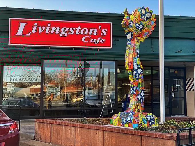 Welcome to flavor town! Livingston's Cafe's vibrant exterior promises a feast for both eyes and taste buds. That colorful sculpture? Just a hint of the creativity inside.