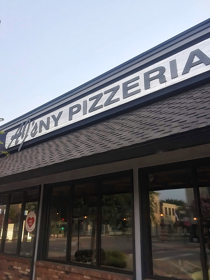 Welcome to AJ's NY Pizzeria, where the Big Apple meets the Little Apple! This unassuming brick facade houses a slice of New York right in the heart of Kansas.