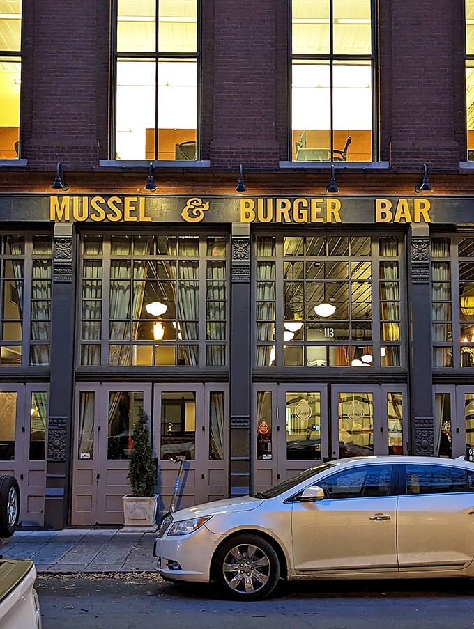 A burger beacon in the heart of Louisville! Mussel & Burger Bar's golden signage promises a feast for the senses.