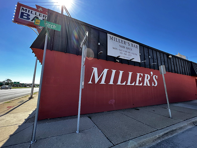A red beacon of burger bliss! Miller's Bar stands proud, its no-frills exterior promising delicious simplicity within. Who needs fancy when you've got flavor?