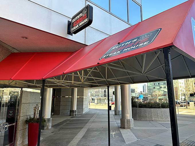Welcome to flavor town! Ruth's Chris Steak House's iconic red awning beckons you into a world where steak dreams come true.