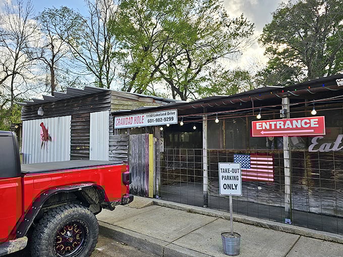 Welcome to the Crawdad Hole, where rustic charm meets seafood paradise. This unassuming exterior hides a treasure trove of flavors that'll make your taste buds do the cha-cha.