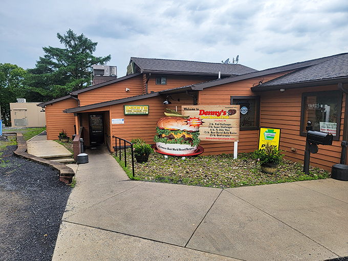 "Welcome to burger paradise!" This inviting entrance to Denny's Beer Barrel Pub promises a feast fit for kings and queens of comfort food.
