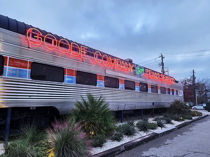 All aboard the flavor express! Goode Company Seafood's converted railroad car exterior promises a journey through Gulf Coast cuisine that's off the rails.