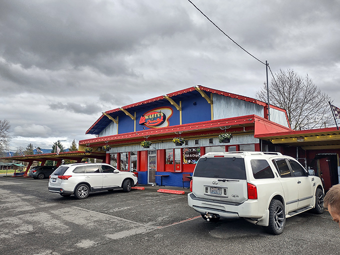 A slice of Americana, served with a side of nostalgia! Wally's Drive-In stands proud, its red, white, and blue facade a beacon for burger lovers everywhere.