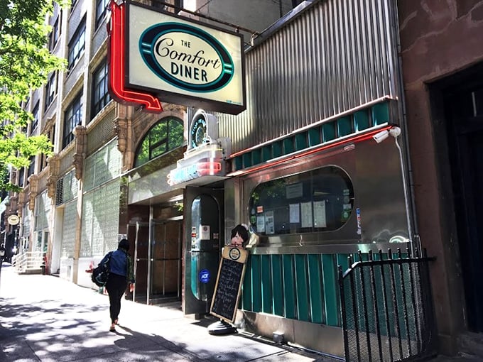 Step into a time machine disguised as a diner! The Comfort Diner's retro sign promises a journey back to when calories were just numbers and neon was king.