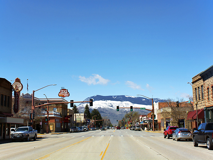 Cody's main drag: Where the Wild West meets modern-day charm. Mountains frame this slice of Americana, inviting you to mosey down memory lane.