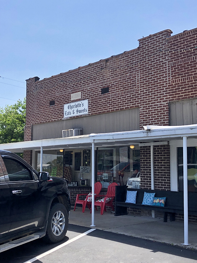 The unassuming brick fa&ccedil;ade of Charlotte's Eats & Sweets stands like a culinary lighthouse in tiny Keo, beckoning hungry travelers with promises of homemade delights inside.