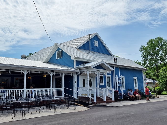 The storybook blue exterior with white trim beckons like a mirage in the Missouri countryside. No filter needed&mdash;this is pure small-town charm at its finest.