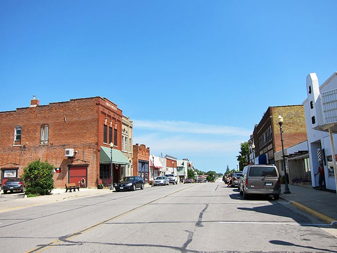 Welcome to Harmony, where silos and small-town charm collide! This view showcases a landscape that's part Norman Rockwell, part American Gothic, and 100% delightful.