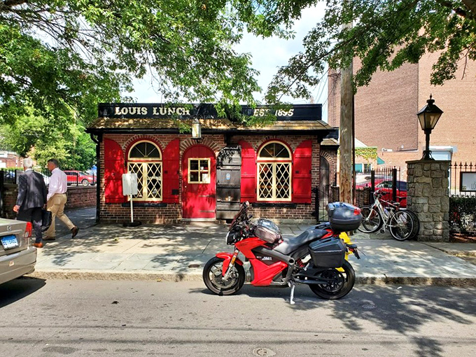 A little red brick building with a big burger legacy. Louis' Lunch stands proud, serving up history and flavor since 1895.
