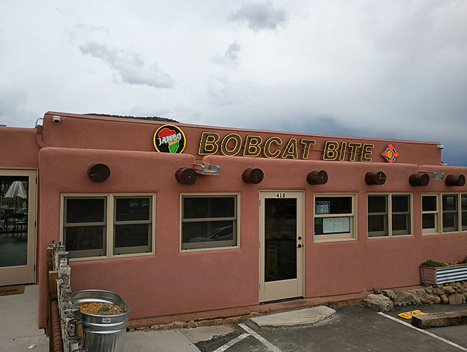Pink adobe charm meets burger paradise! This unassuming exterior hides a world of flavor waiting to be discovered.