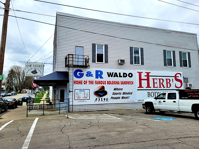 The unassuming exterior of G&R Tavern stands like a culinary lighthouse in tiny Waldo, Ohio, beckoning hungry travelers with promises of legendary sandwiches.