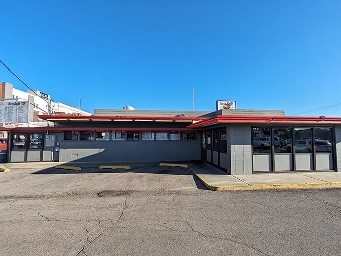 Welcome to burger paradise! Hires Big H stands proud, its retro sign a beacon of hope for hungry souls seeking comfort food nirvana.