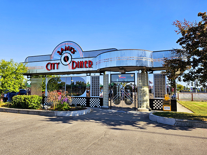 Step into a time machine, folks! This retro-fabulous exterior is your portal to comfort food paradise. Sami's City Diner beckons with its neon glow and promise of delicious nostalgia.
