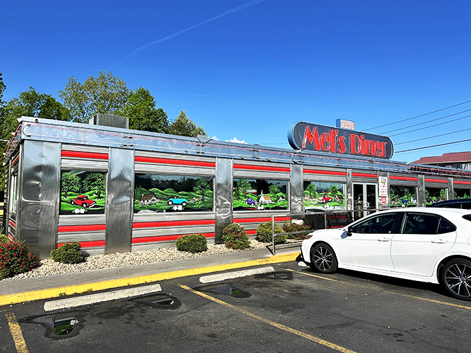 Step into a time machine disguised as a diner! Mel's gleaming exterior promises a journey back to the days when milkshakes ruled and jukeboxes rocked.