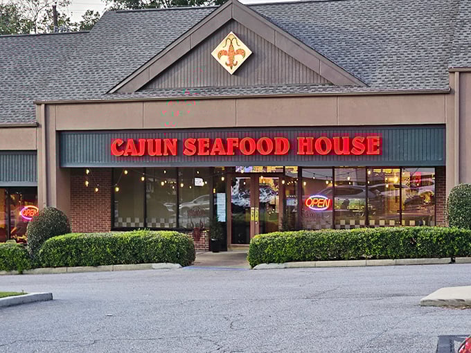 Neon dreams and seafood schemes! This unassuming strip mall facade hides a treasure trove of Cajun delights that'll make your taste buds do a happy dance.