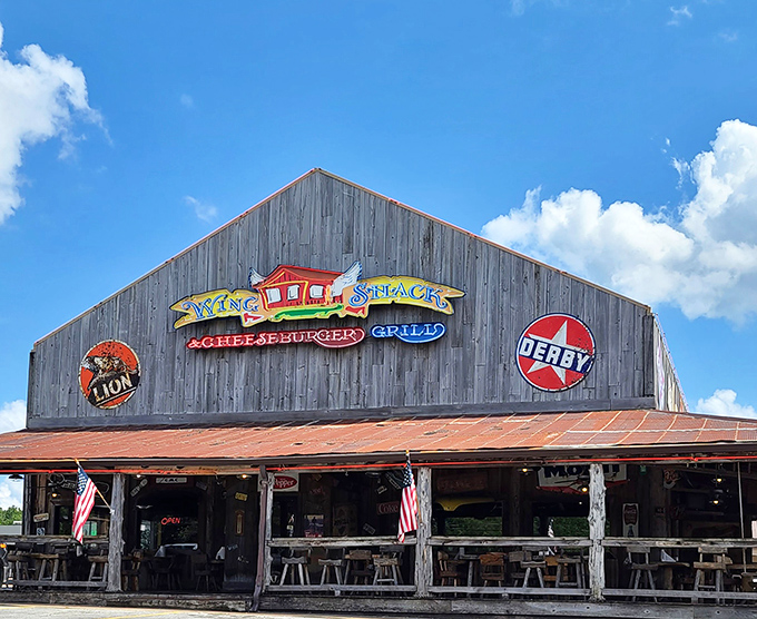 The rustic wooden facade of Wing Shack stands proud against the Arkansas sky, like a delicious mirage beckoning hungry travelers from miles around.