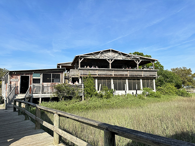 Rustic charm meets coastal bliss! This weathered wooden wonder looks like it's been telling seafood stories for decades.