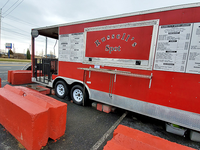 A fiery red beacon of barbecue bliss! Russell's Spot isn't just a food truck; it's a siren call to meat lovers everywhere.