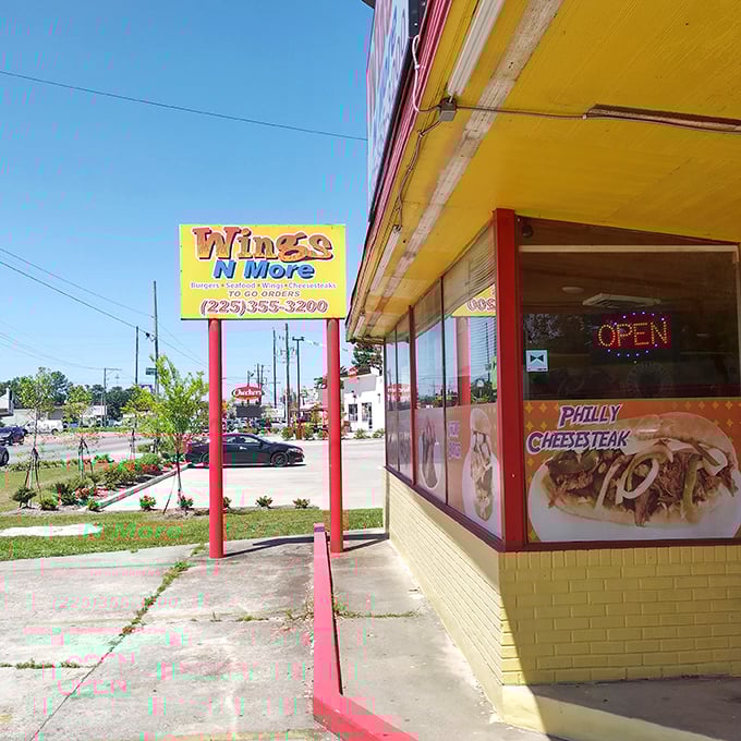 The sunshine-yellow exterior with bold red trim isn't trying to win architectural awards&mdash;it's saving all its energy for what's cooking inside.