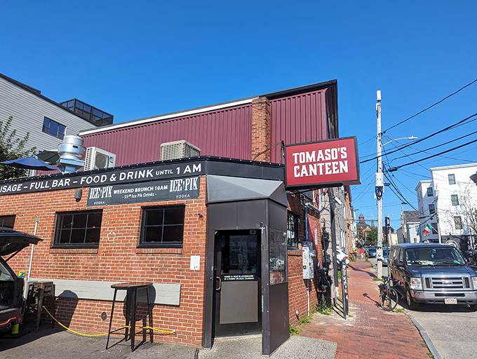 A brick facade that screams "hidden gem." Tomaso's Canteen: where culinary adventures begin and diet plans go to die.