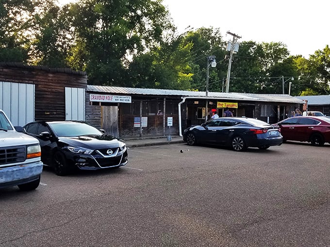 Welcome to the Crawdad Hole, where rustic charm meets seafood paradise. This unassuming exterior hides a treasure trove of flavors that'll make your taste buds do the cha-cha.