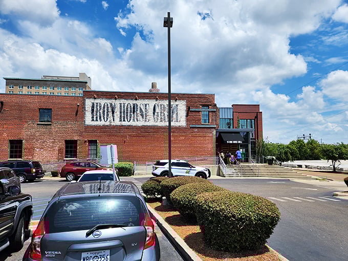 Step into a time machine with a side of Southern charm! The Iron Horse Grill's exterior blends historic brick with modern flair, promising a feast for all senses. 