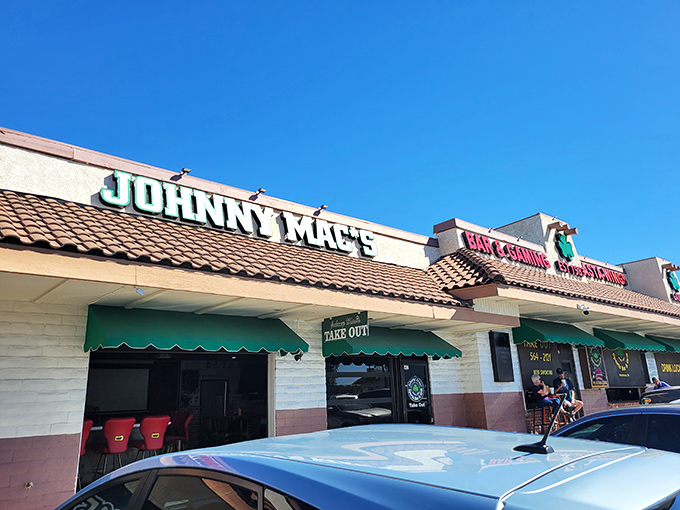 Johnny Mac's: Where sports dreams and buffalo wings collide! This unassuming exterior hides a flavor paradise waiting to be discovered.