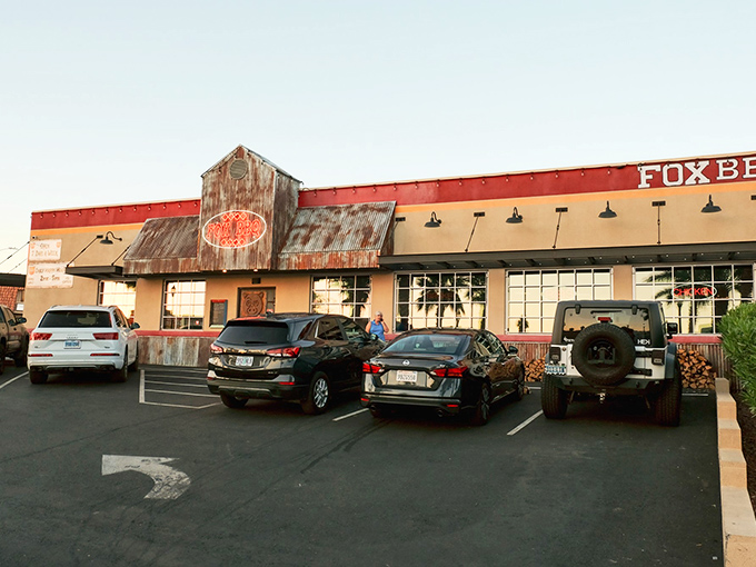 Welcome to BBQ paradise! Fox Smokehouse BBQ's rustic exterior promises a flavor-packed journey that'll make you forget you're in the desert. 