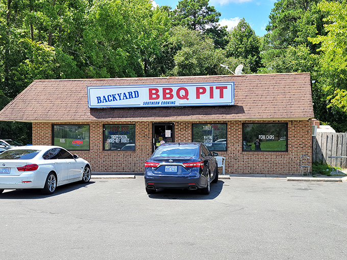 Welcome to BBQ paradise! Backyard BBQ Pit's unassuming exterior hides a world of smoky delights waiting to be discovered.