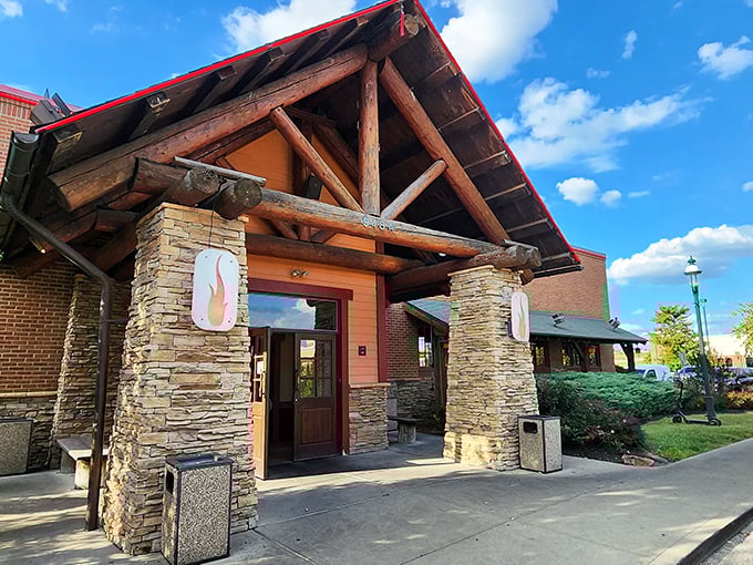 Welcome to BBQ paradise! Smokey Bones' rustic exterior promises a feast for the senses, like stumbling upon a secret mountain lodge dedicated to the art of smoke and flame.