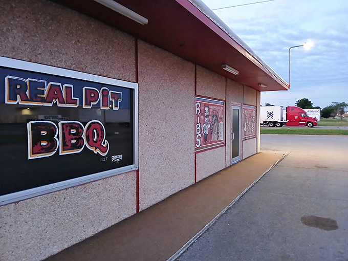 "Real Pit BBQ" isn't just a name, it's a promise. This unassuming facade hides a smoky paradise that'll make your taste buds do a happy dance.
