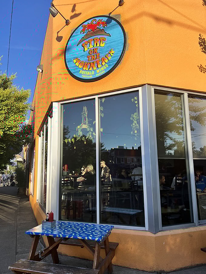 Welcome to wing paradise! Fire on the Mountain's vibrant orange exterior is like a beacon calling all flavor seekers to its doorstep.