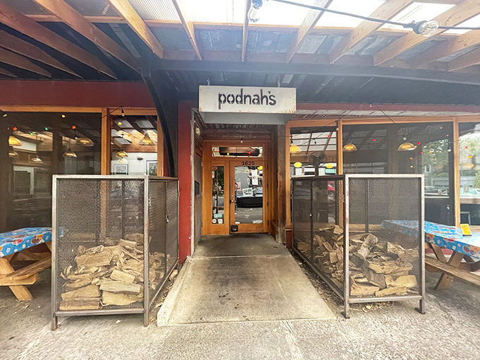 Welcome to barbecue nirvana! Podnah's rustic exterior promises smoky delights within, like a meaty treasure chest waiting to be opened.
