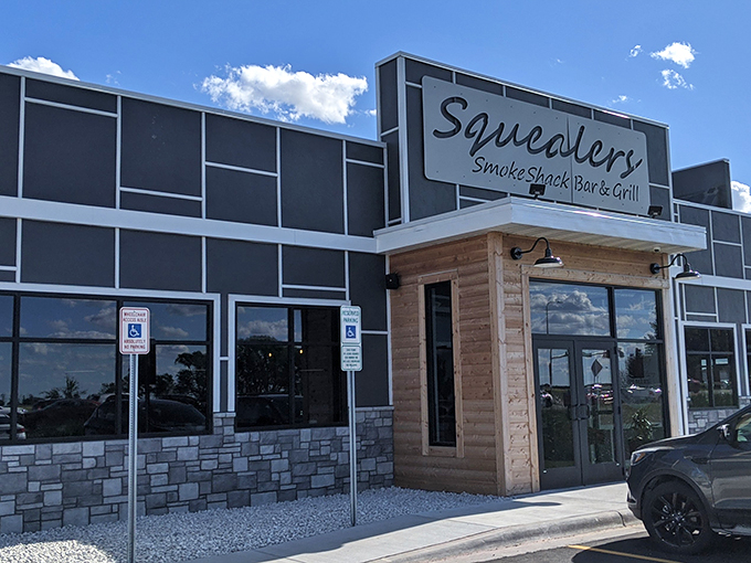Welcome to BBQ paradise! Squealer's modern exterior belies the smoky, savory delights waiting inside. It's like finding a gourmet food truck parked in the Emerald City.