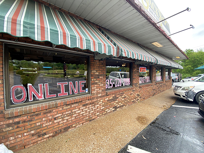 The brick-and-mortar barbecue temple beckons with its iconic sign and pink pig sentinel. Nashville's meat sanctuary awaits.