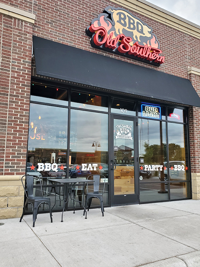 Welcome to BBQ paradise! Old Southern's neon sign glows like a beacon, guiding hungry souls to smoky nirvana.