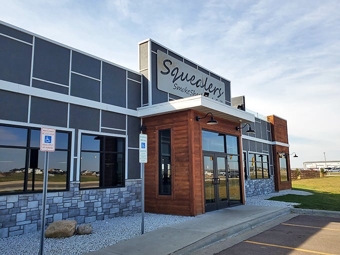 Welcome to BBQ paradise! Squealer's modern exterior belies the smoky, savory delights waiting inside. It's like finding a gourmet food truck parked in the Emerald City.