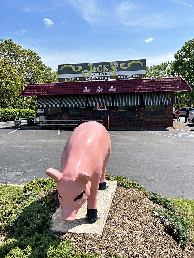The brick-and-mortar barbecue temple beckons with its iconic sign and pink pig sentinel. Nashville's meat sanctuary awaits.