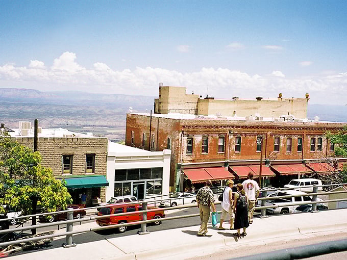 Jerome's main street: Where the Wild West meets modern charm. Vintage storefronts and parked cars create a scene that's part John Wayne, part hipster haven.