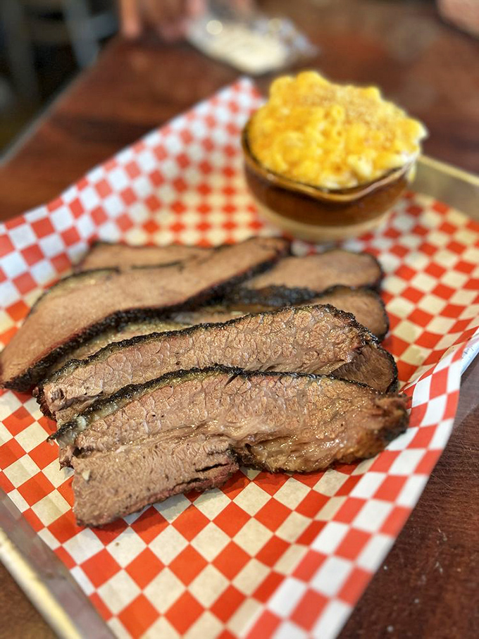Brisket so tender, it practically slices itself! This beauty has more layers than a Shakespeare play, and it's twice as satisfying.