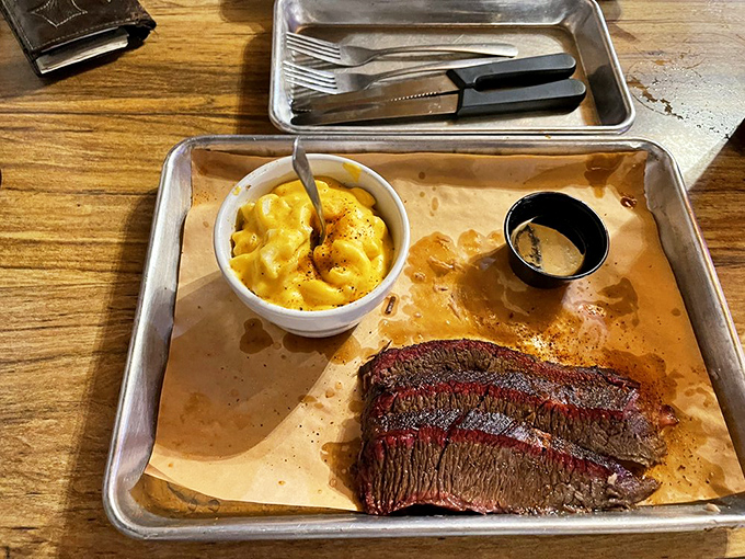 Brisket with bark so perfect it belongs in a museum, paired with that legendary mac and cheese for a match made in heaven.