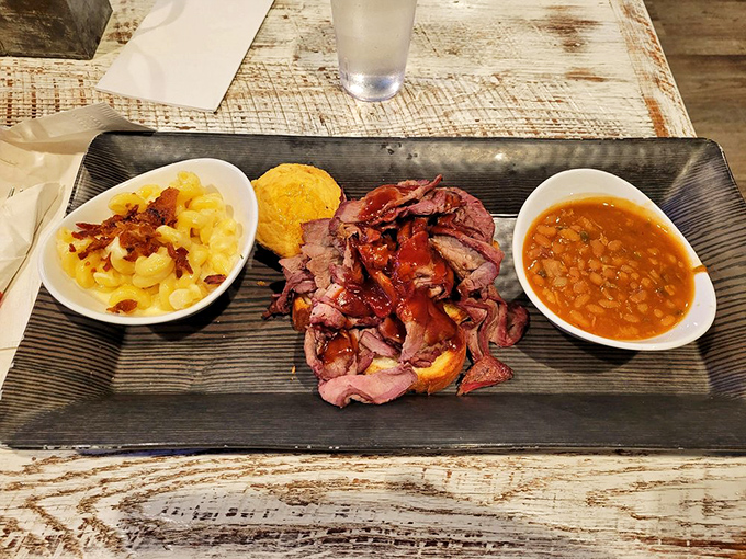 Brisket bliss on a bun! This sandwich is proof that good things come to those who smoke... their meats, that is.