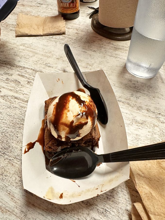 This brownie's not just a dessert, it's a chocolate lover's fever dream. Resistance is futile, just grab a spoon and dive in.