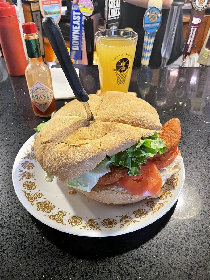 Buffalo chicken, meet your match. This sandwich packs more flavor than a Seinfeld marathon – and it's twice as satisfying.