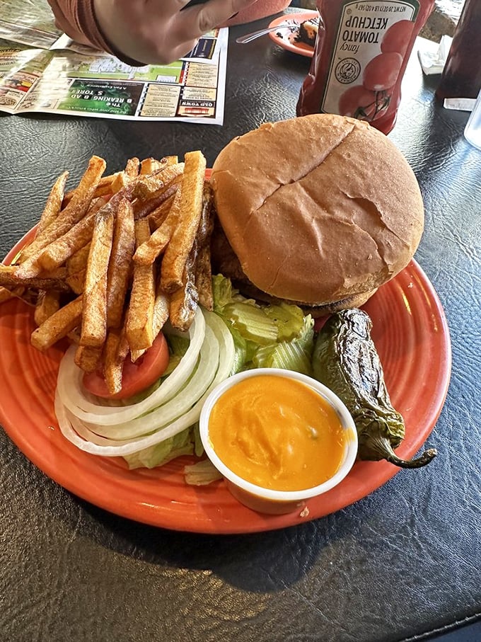 The classic American duo: burger and fries. It's like Batman and Robin, only with more cheese and a side of crispy, golden sidekicks.