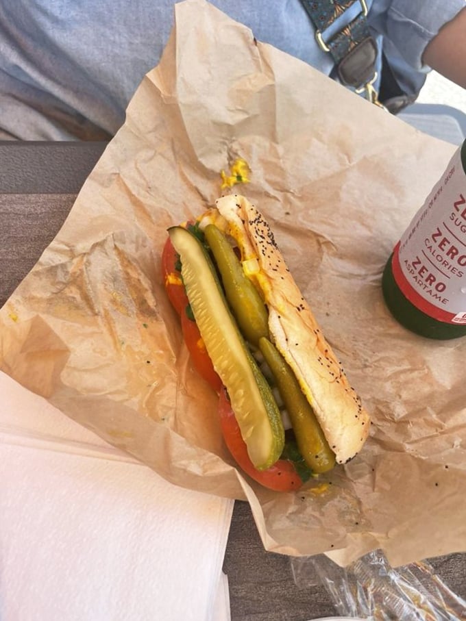 Chicago's finest, Kentucky style! This dog is dressed to impress with more toppings than a Derby hat has feathers.