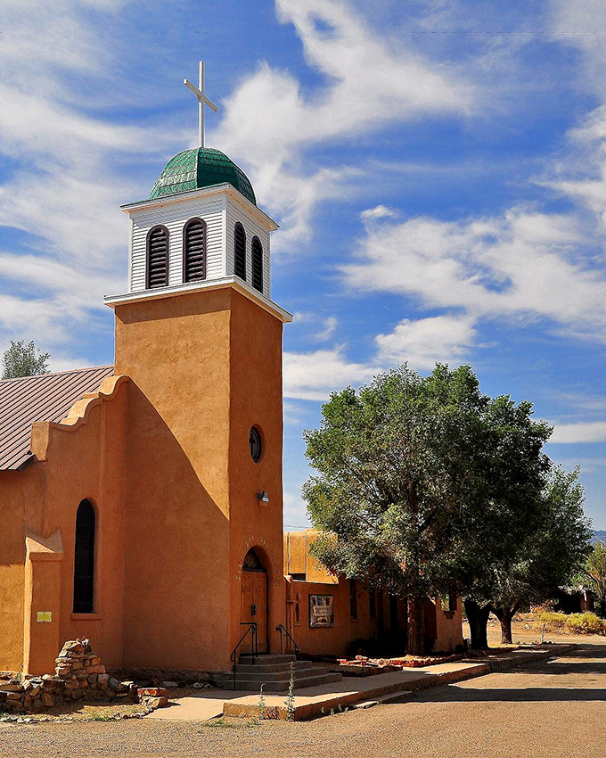 Holy adobe, Batman! This church isn't just reaching for the heavens; it's bringing a slice of paradise to the desert.