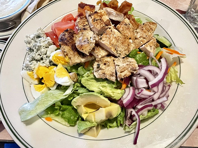 Who said salads can't be fun? This Cobb is like a party on a plate, with more toppings than a loaded baked potato convention.